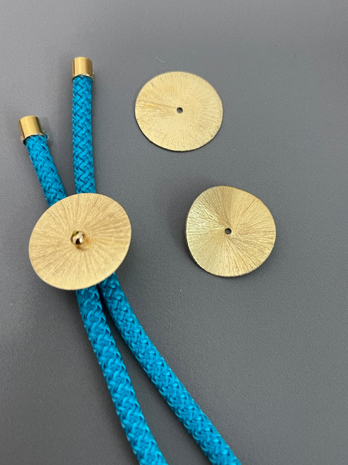 Gold disc – Sun Beads Caguas